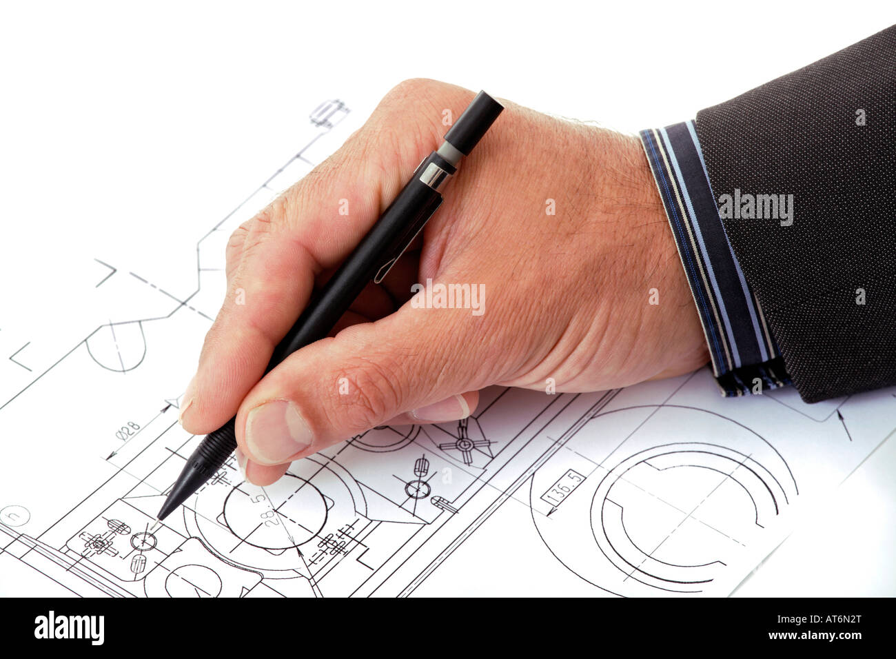 Man's hand pointing at blueprint with pen Stock Photo - Alamy
