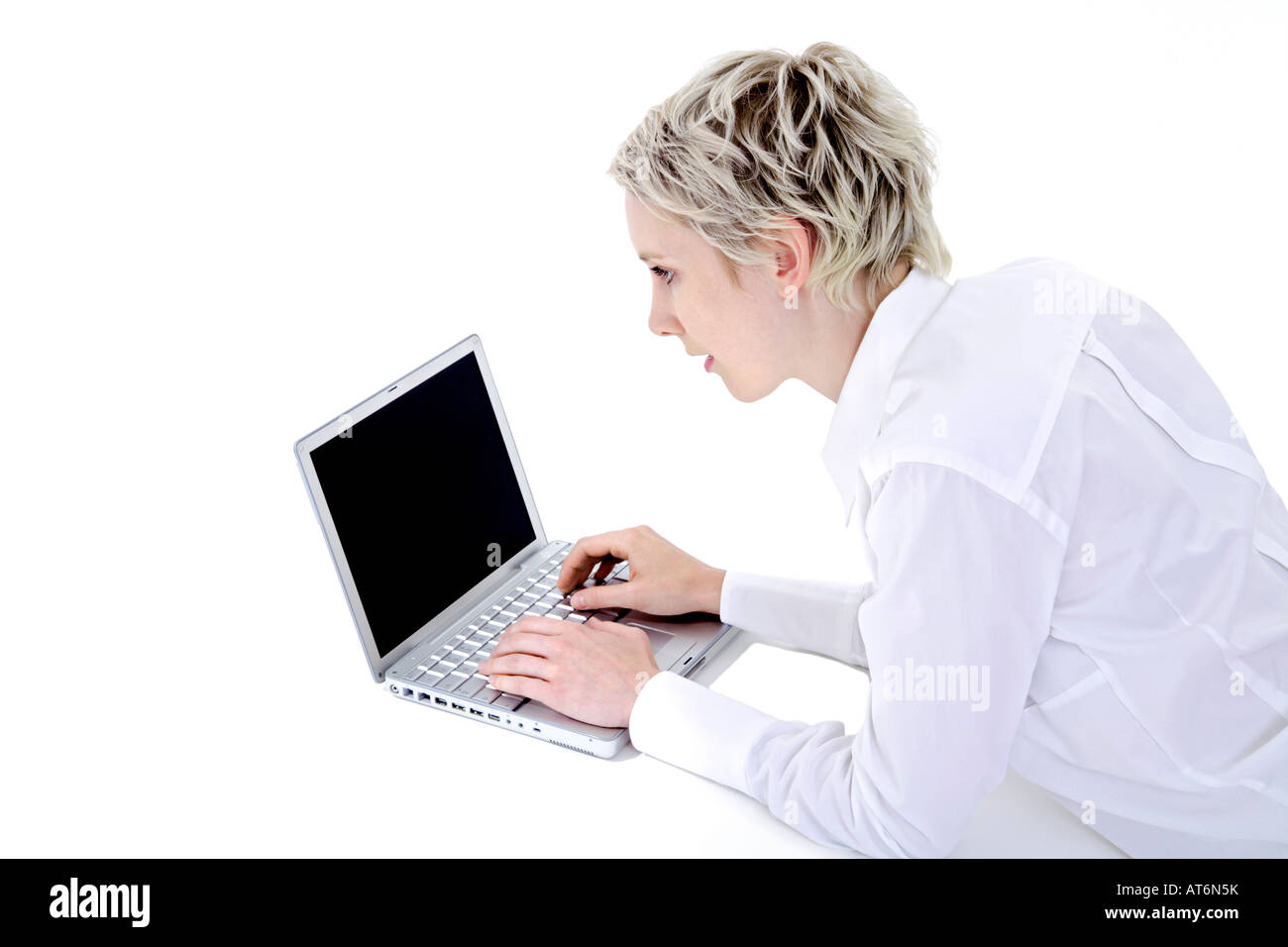 Young woman using Laptop, portrait Stock Photo - Alamy