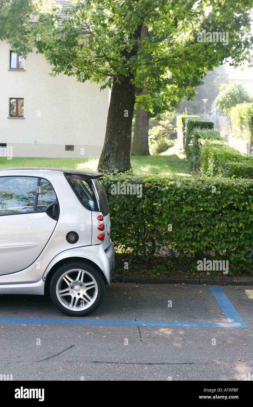 Small Car Parked in Big Parking Space, Zurich Stock Photo - Alamy