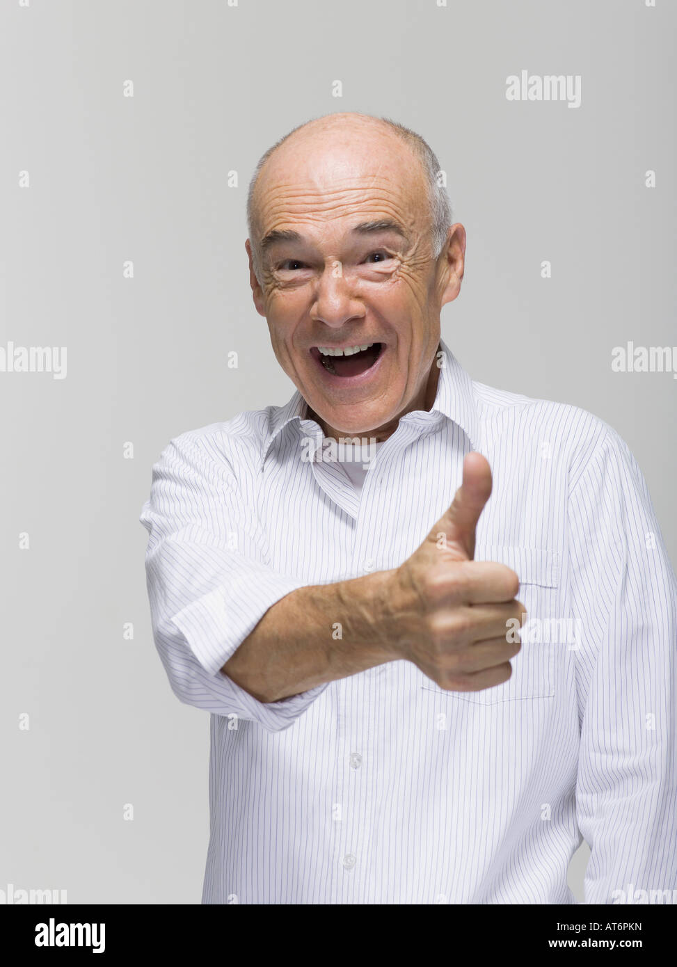 Senior man giving thumbs up, portrait, close-up Stock Photo - Alamy