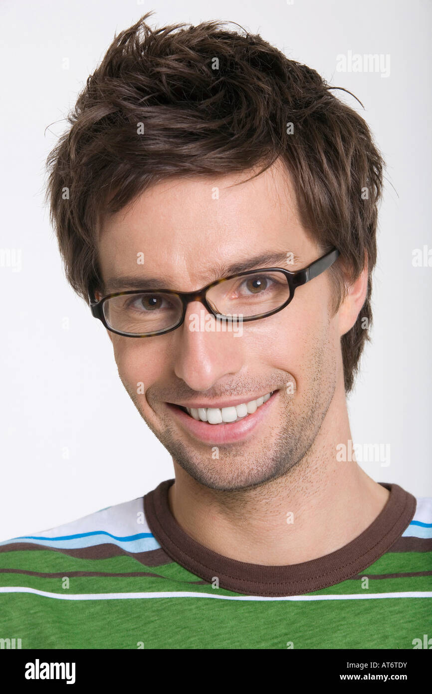 Portrait of a young man, smiling Stock Photo - Alamy