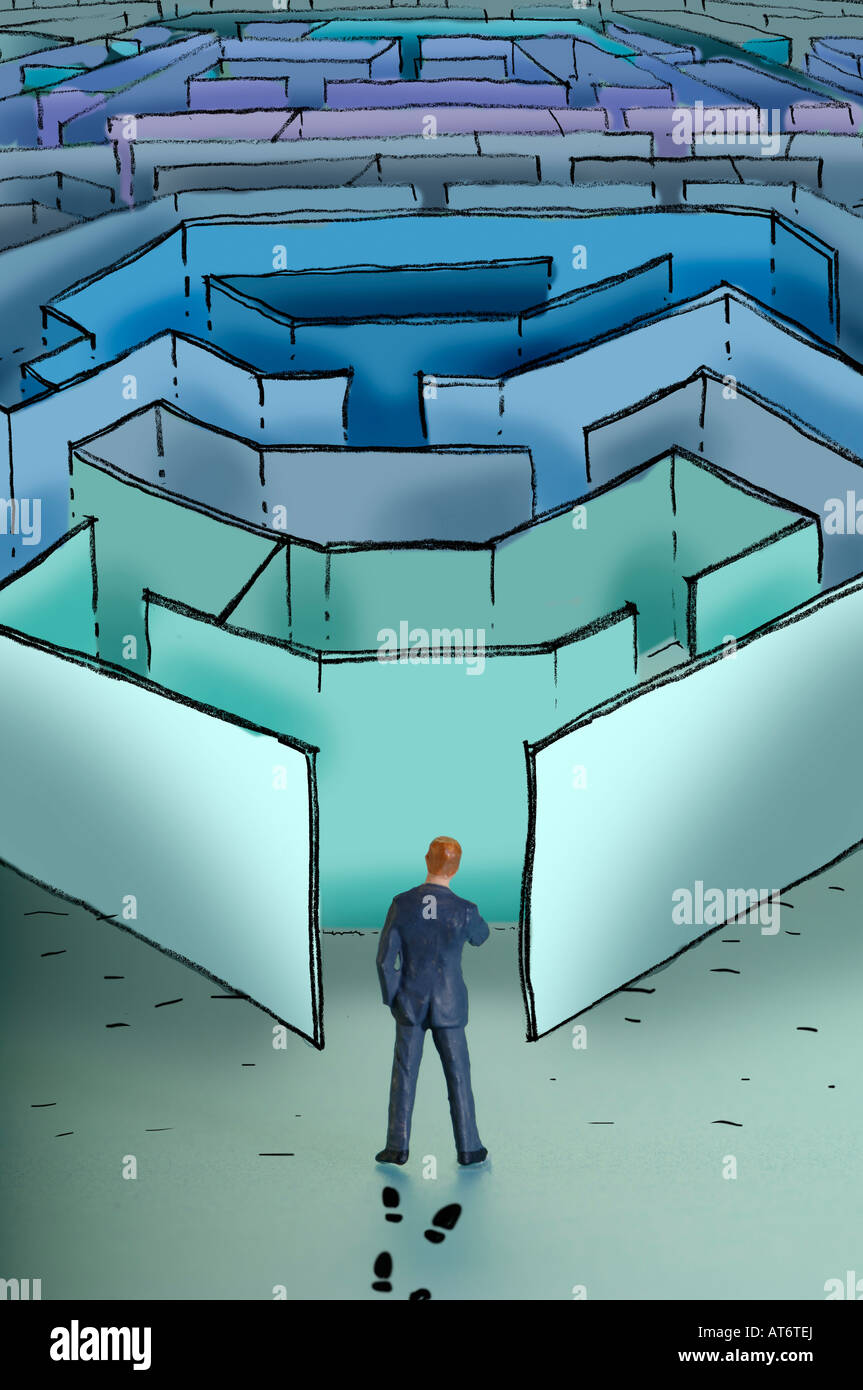 Businessman entering maze Stock Photo - Alamy