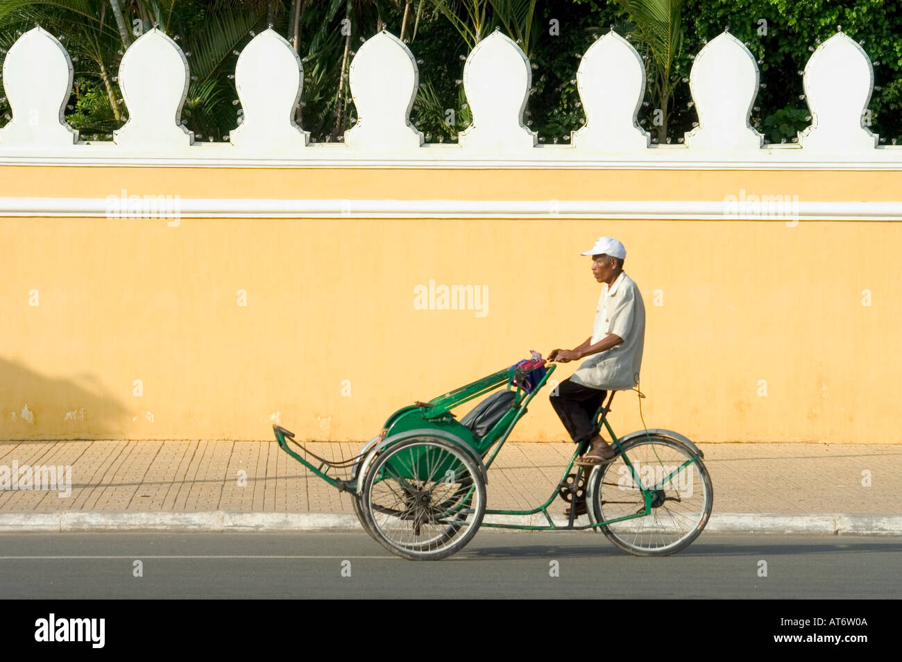rickshaw out side Royal Palace Phnom Penh Cambodia South East Asia ...