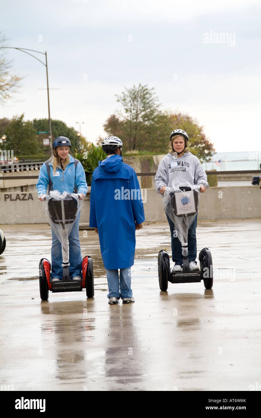 people recieving a lesson on using a Segway Personal Transporter before ...