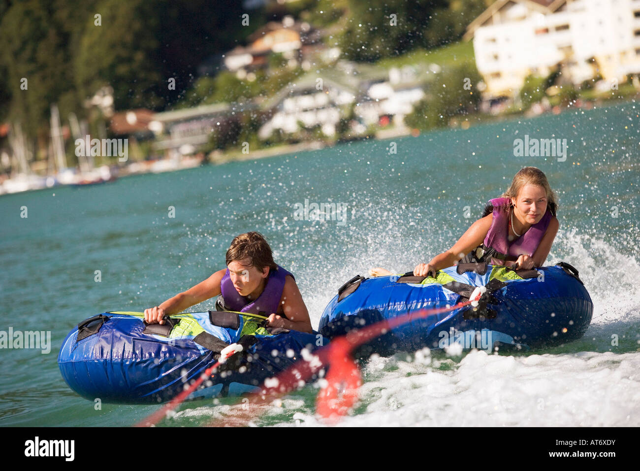 Austria, Moon Lake, Children (4-15) (16-17) riding water sled Stock ...