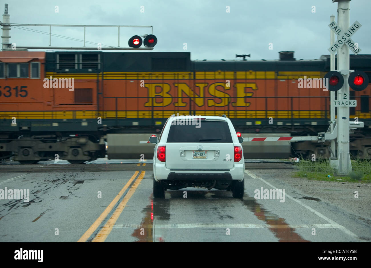 Car crossing railroad tracks hi-res stock photography and images - Alamy