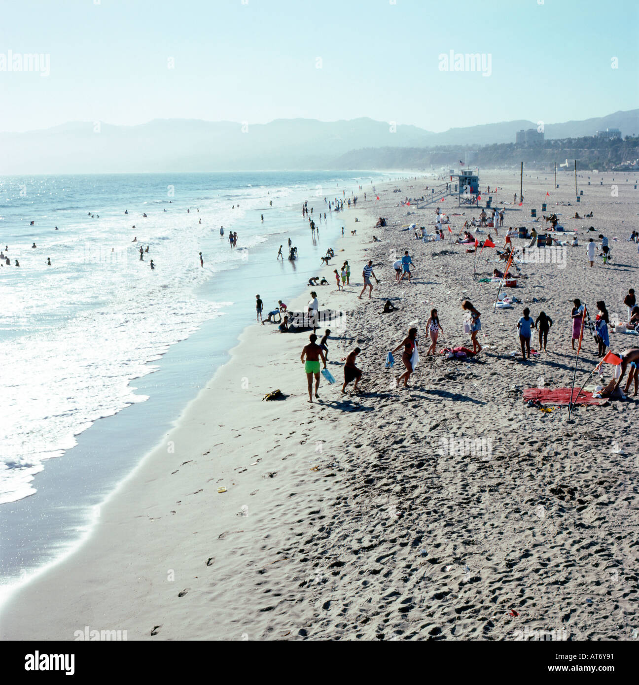 A view looking north to Malibu beach of people on Santa Monica beach in ...