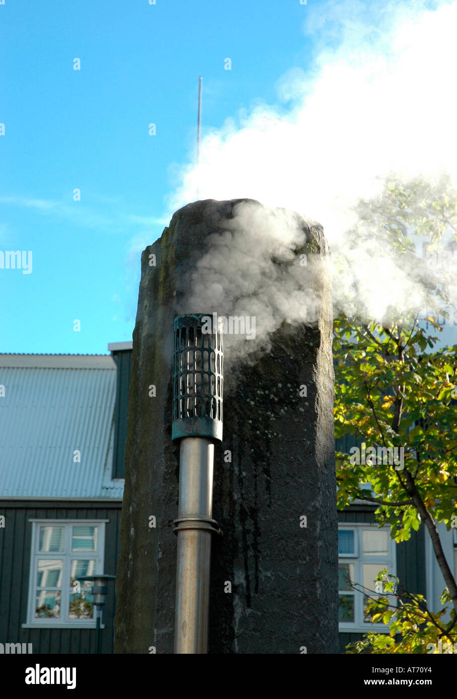 Vents for steam for geothermal energy in city of Reykjavik Iceland ...