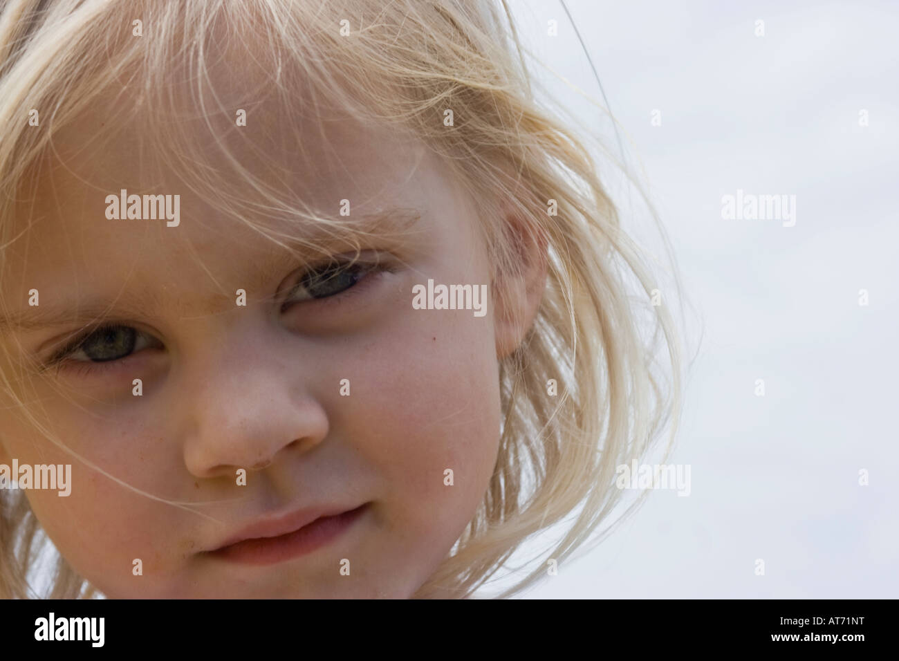 Girl squinting sun hi-res stock photography and images - Alamy