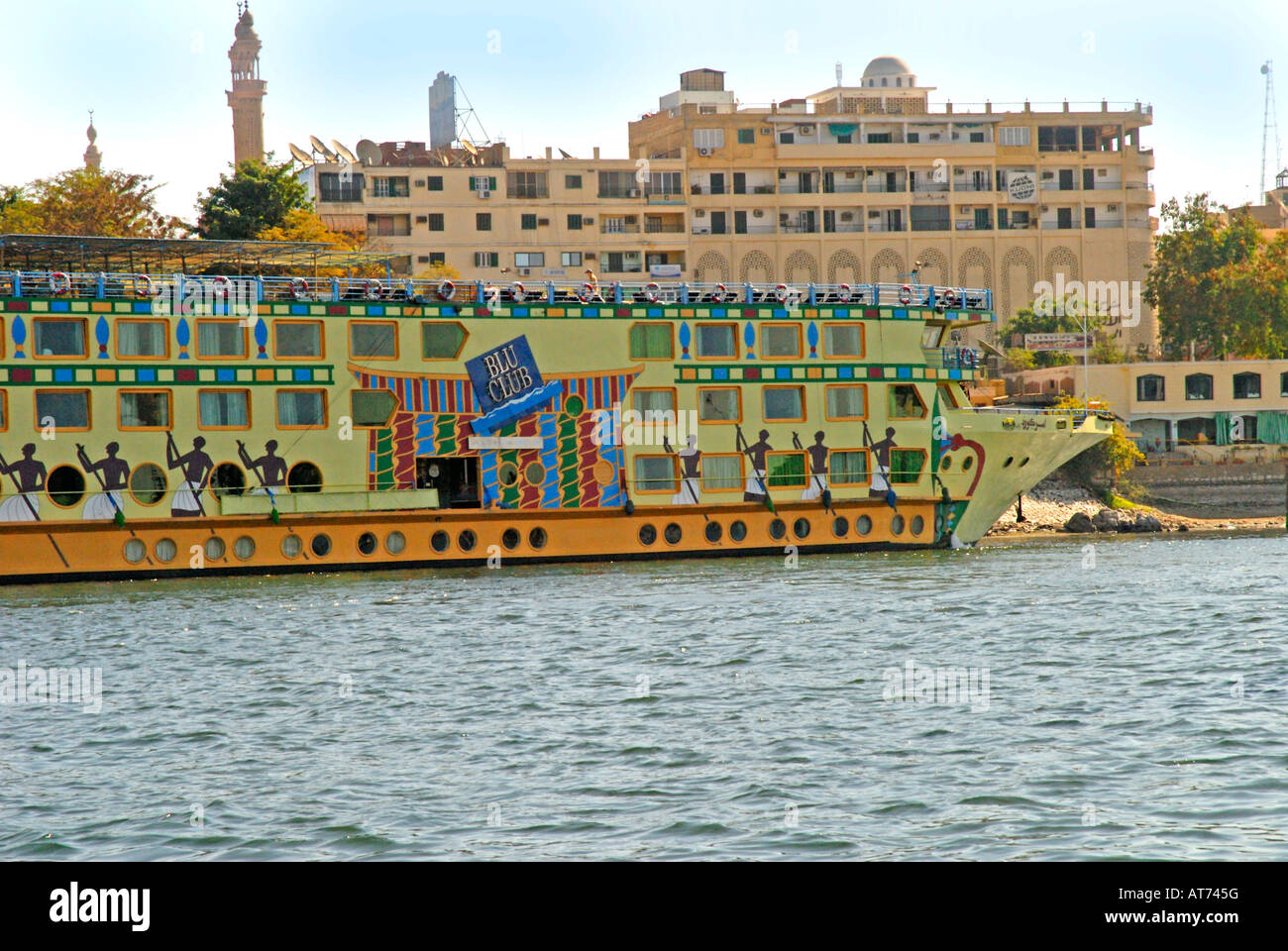 Nile Cruise ship at Aswan with images of old fashioned Pharonic rowing ...
