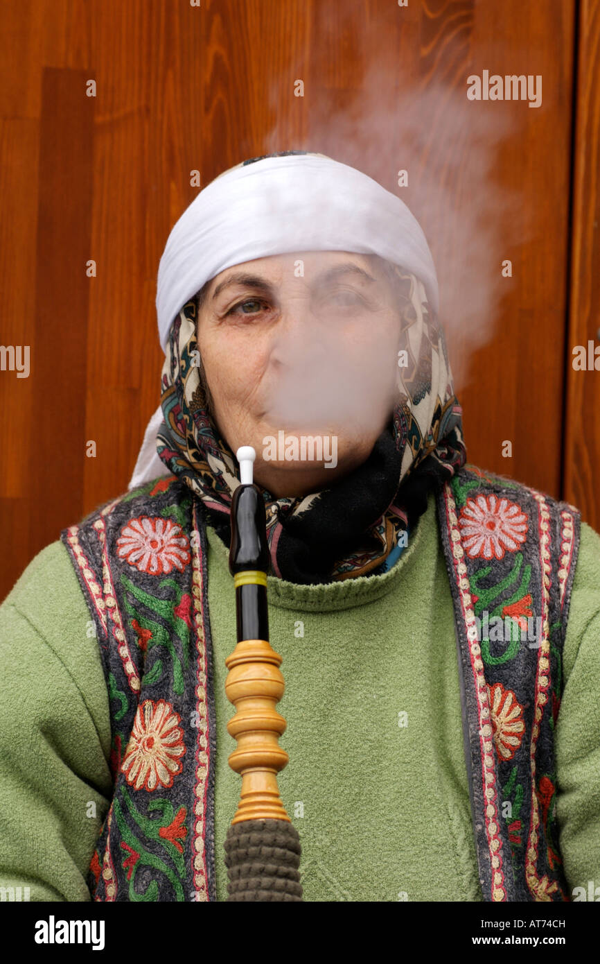 Turkish woman smoking a sheesha water-pipe in Istanbul, Turkey Stock ...