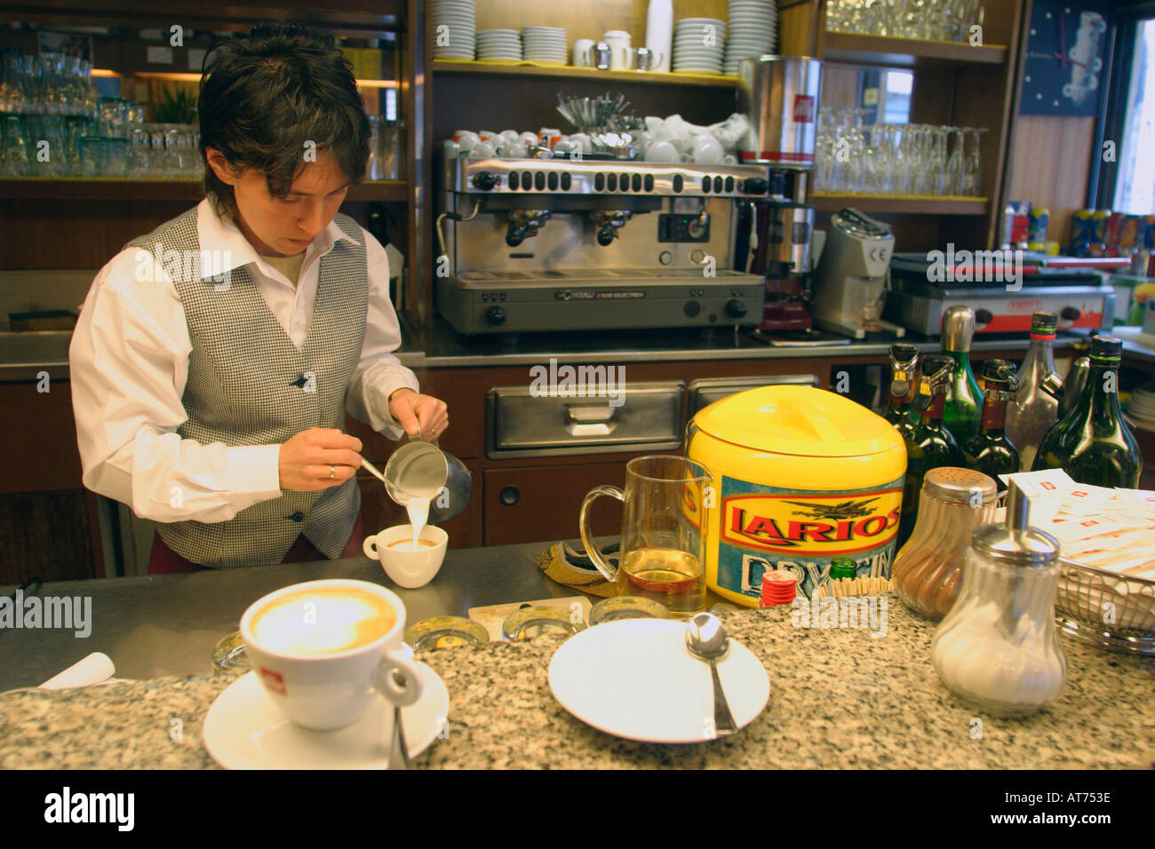 Serving coffee in a Venetian cafe Stock Photo - Alamy
