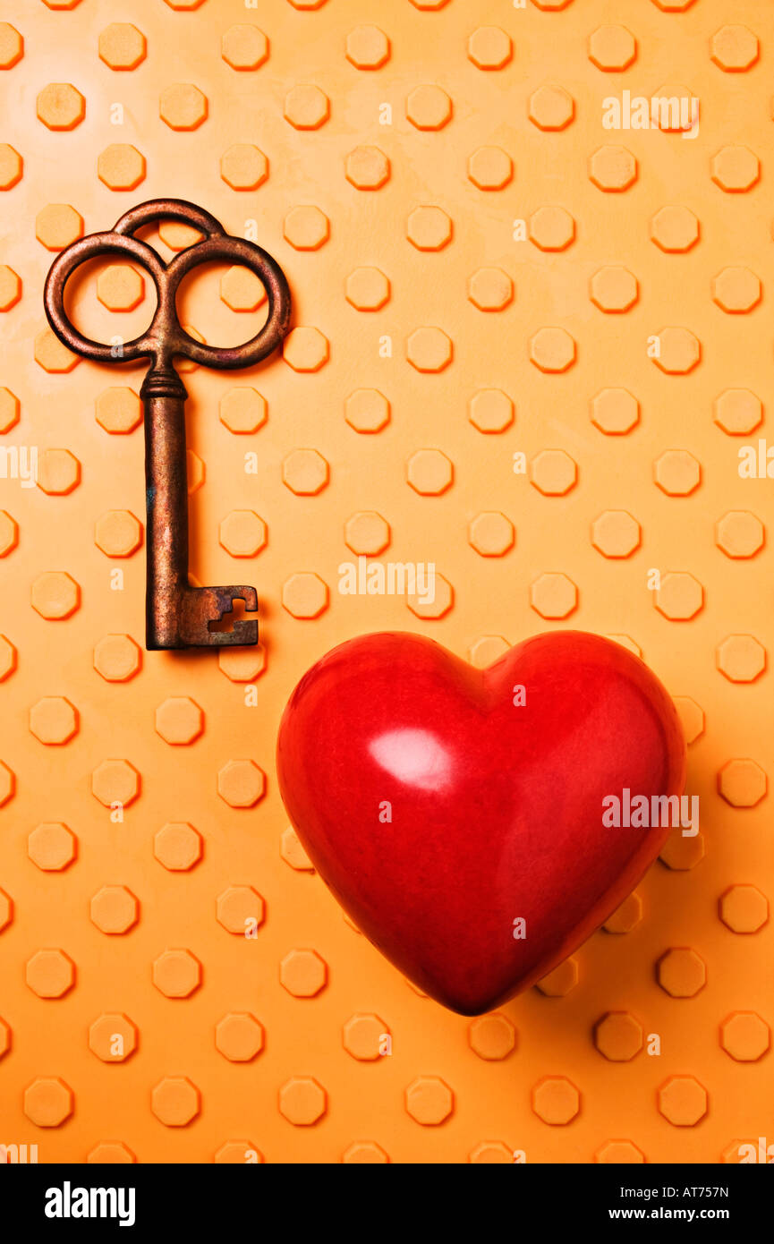 Red heart and key Stock Photo - Alamy