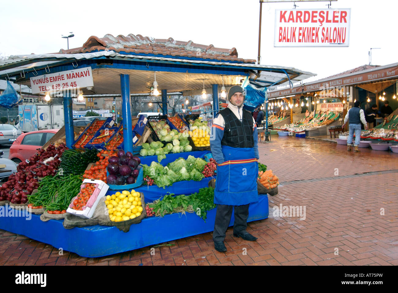 Turkish grocer in the Kumkapi fish market in Istanbul, Turkey Stock ...