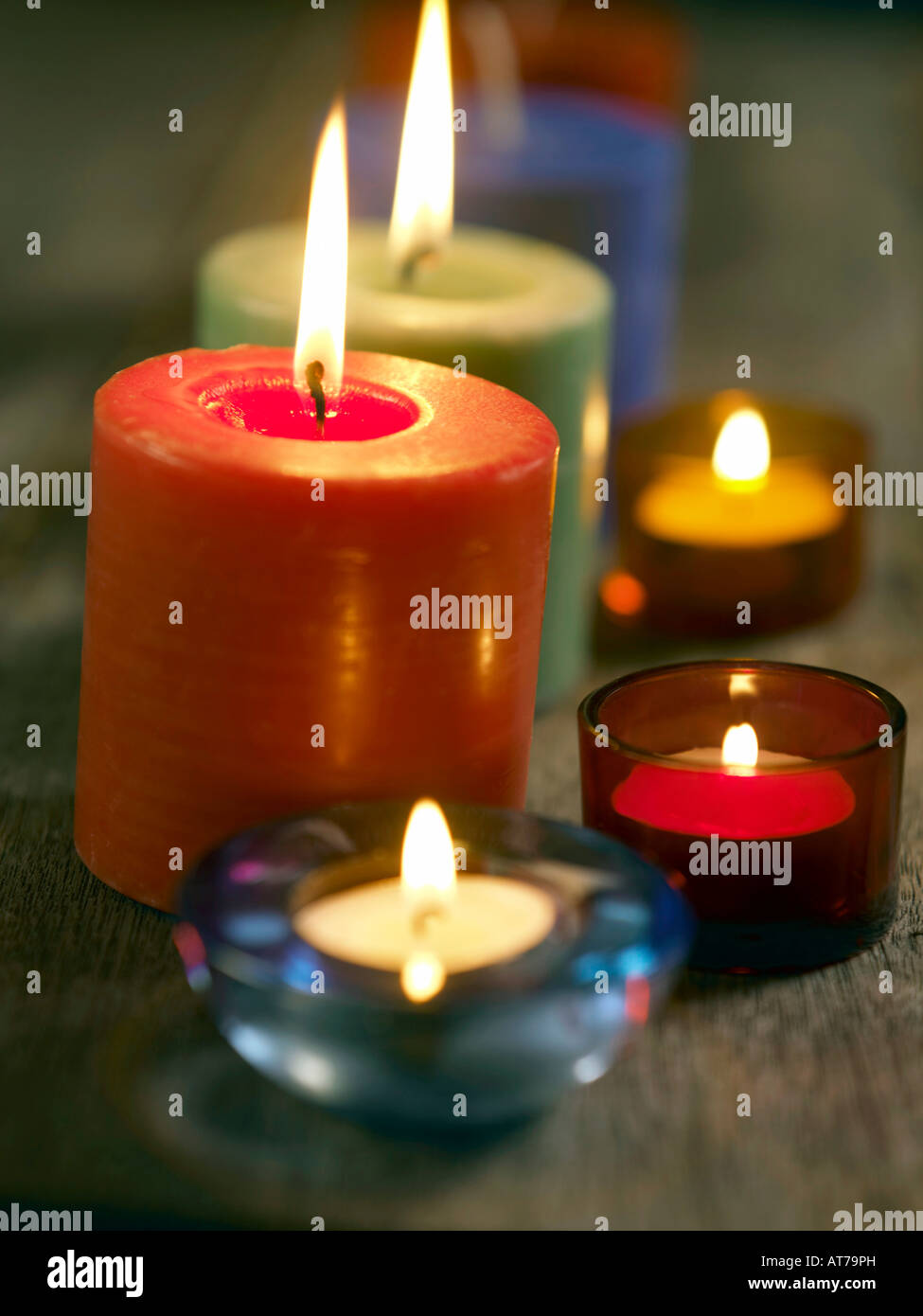 Assorted colour candles and tea light candles Stock Photo - Alamy