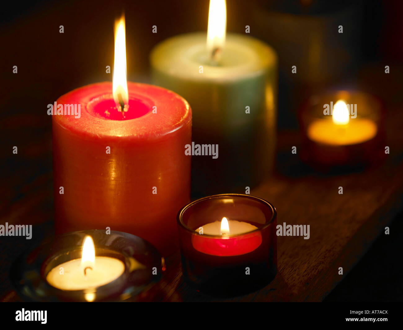 Assorted colours candles and tea light candles Stock Photo - Alamy
