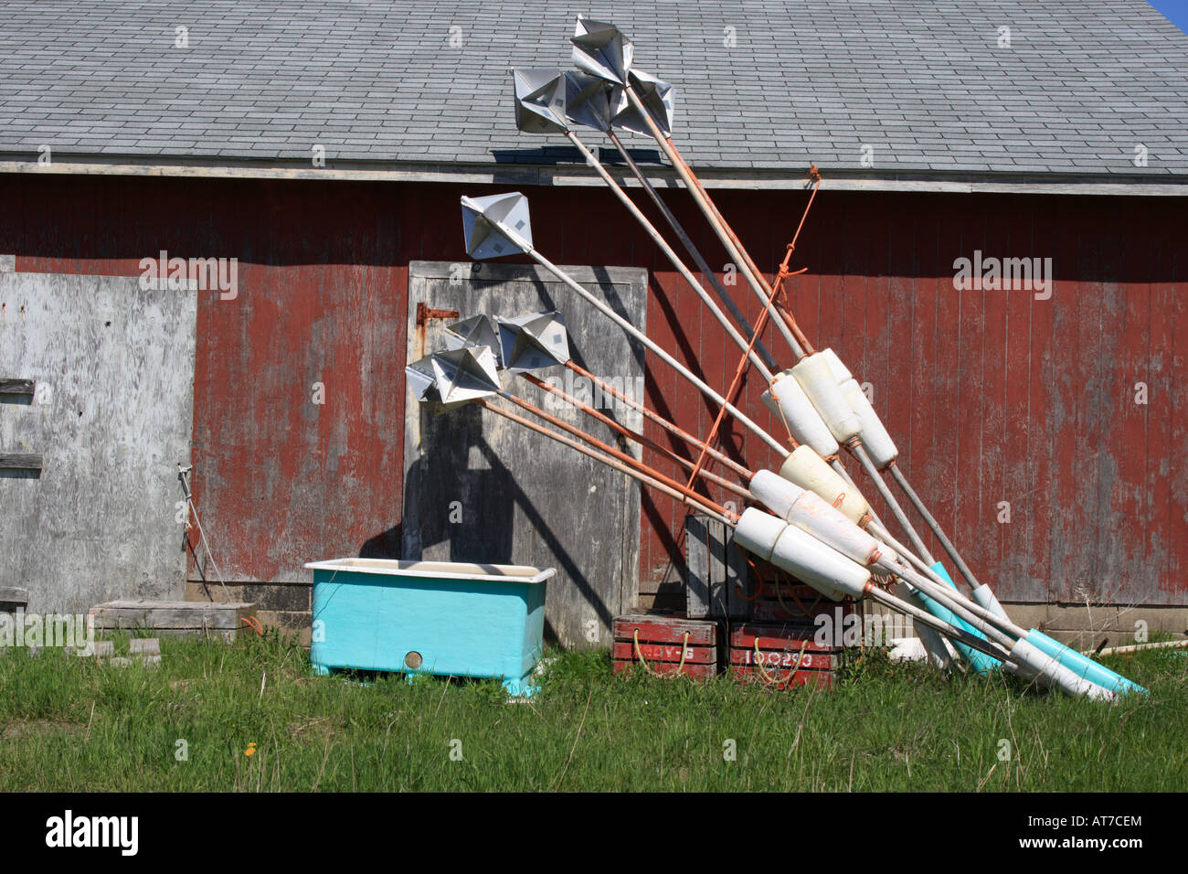 buoys leaning on wall in East Harbour Ingomar, Nova Scotia, Canada ...
