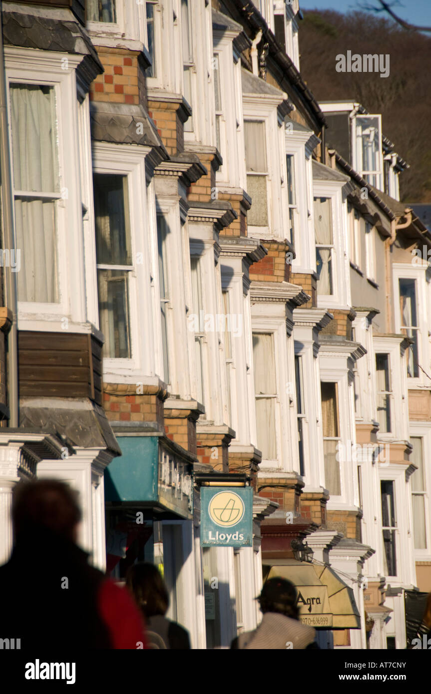 Bay windows on a row of large terraced houses Aberystwyth Wales UK ...