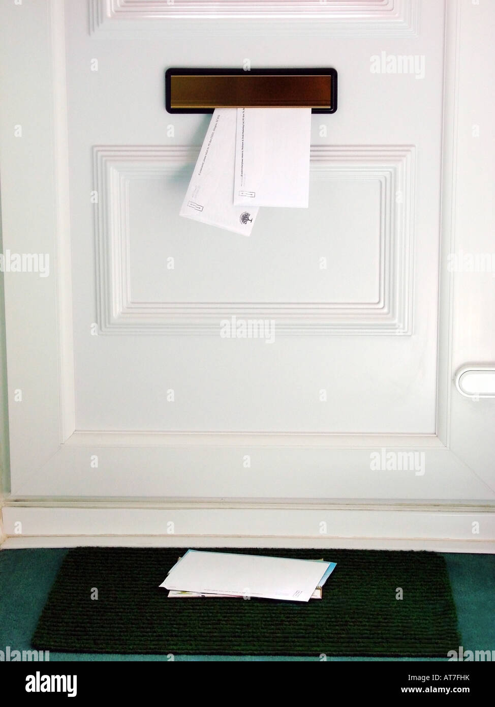 Mail Letter's coming through a Letterbox Stock Photo - Alamy