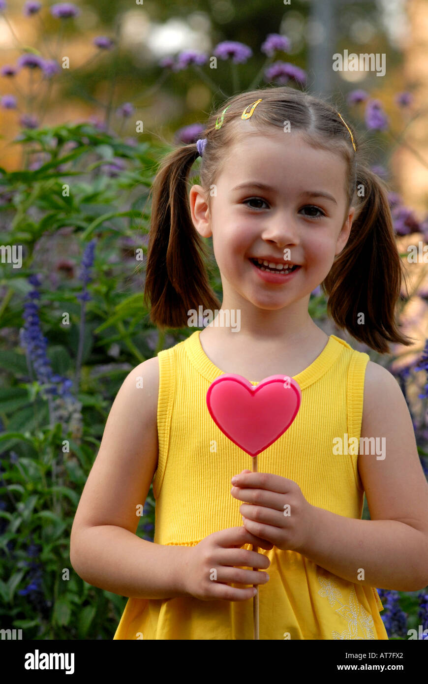Girl with Love you heart Stock Photo - Alamy