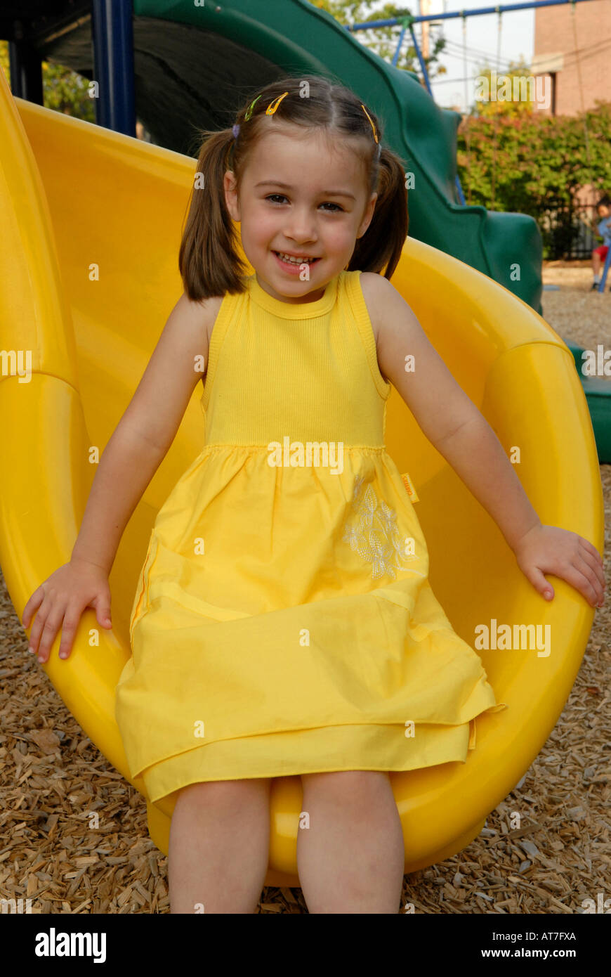 Little girl in a park Stock Photo - Alamy