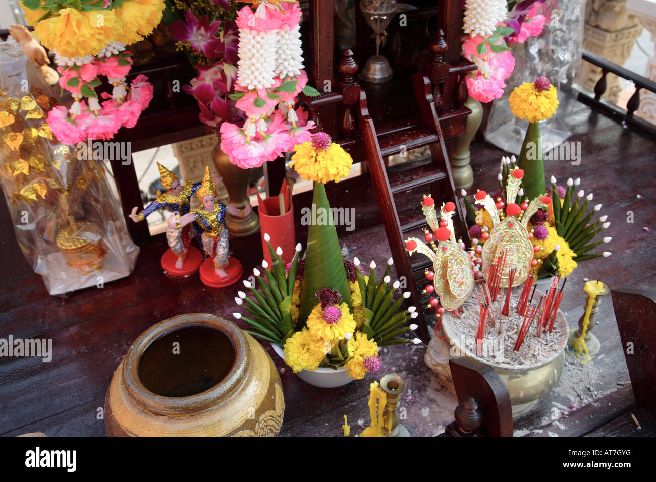 Thailand Phetchaburi spirit house offerings decoration Stock Photo - Alamy