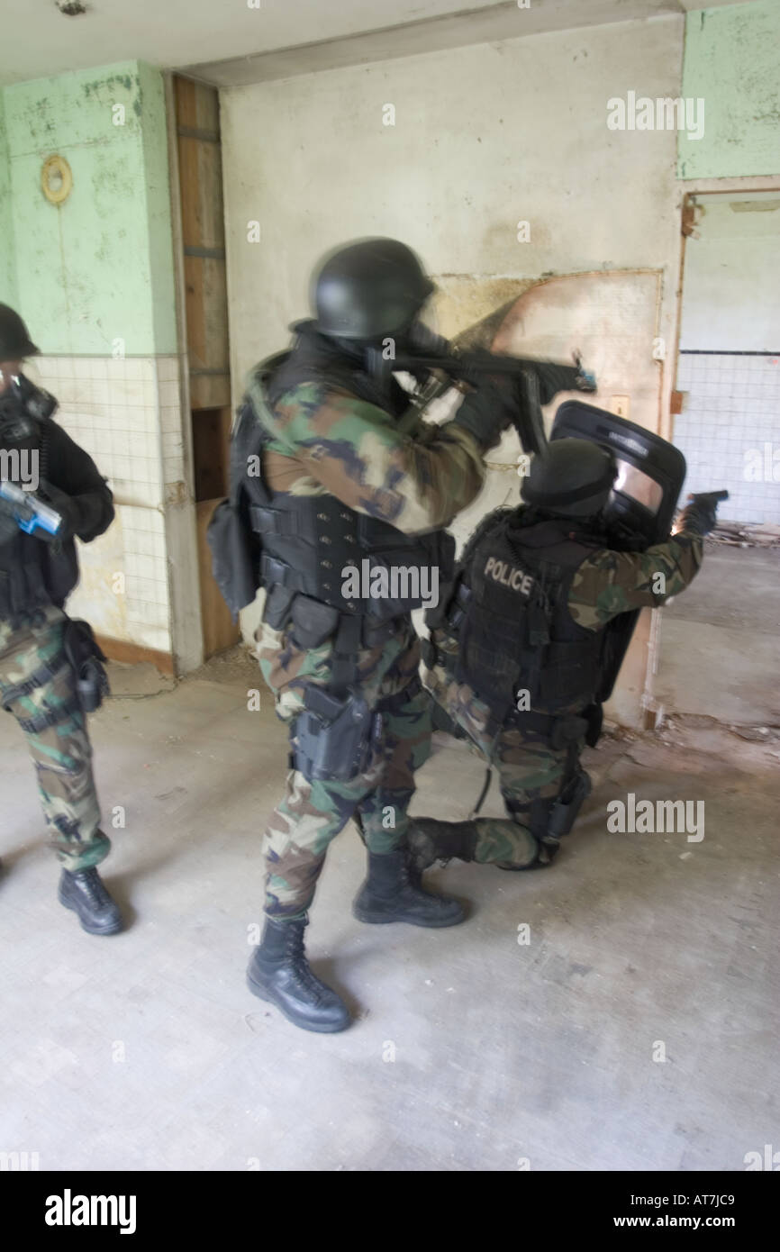 Police SWAT team entering room inside building Nebraska State Patrol ...