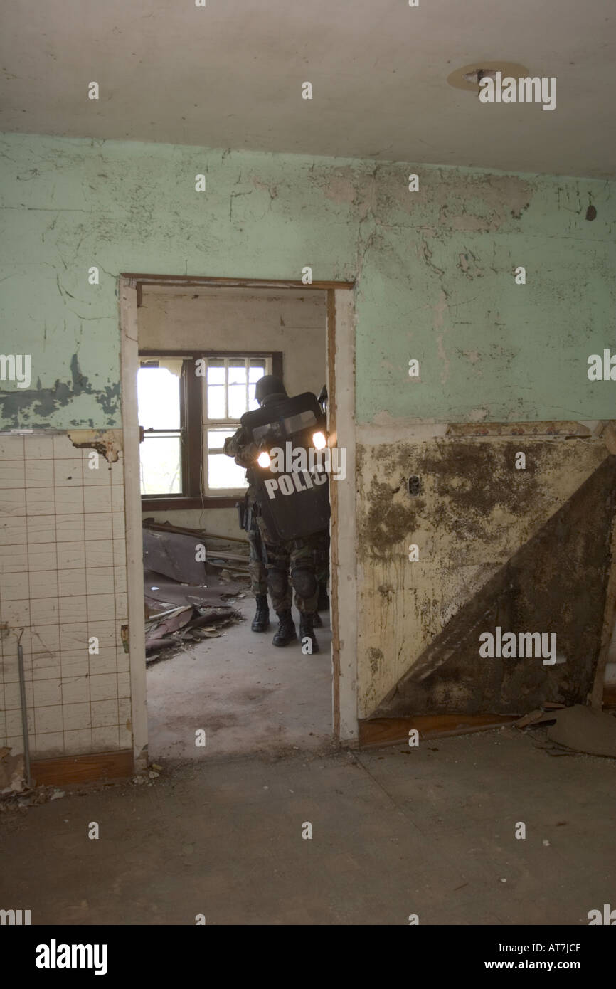 Police SWAT team entering room inside building Nebraska State Patrol ...