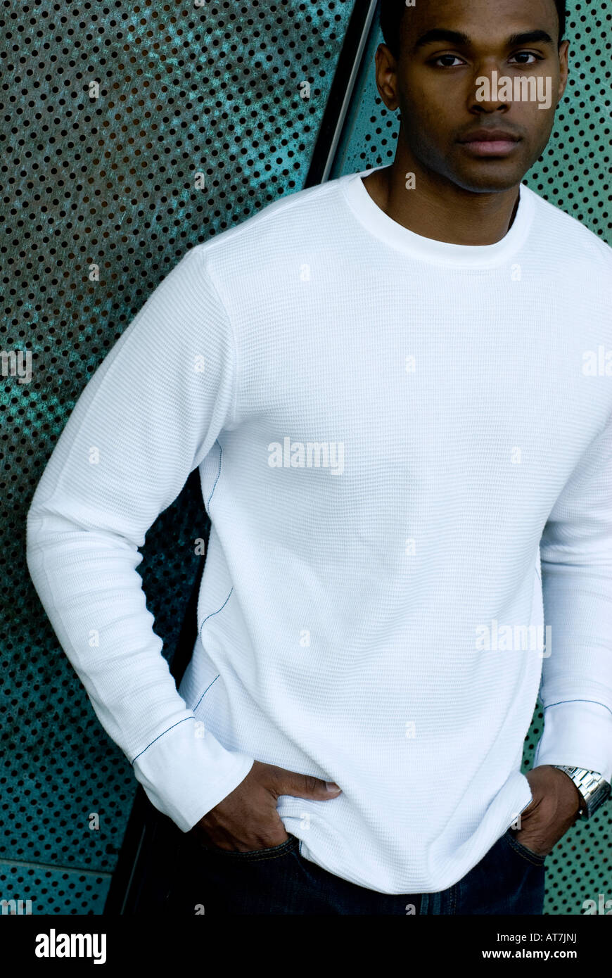 Attractive young African American male playing posing Stock Photo - Alamy