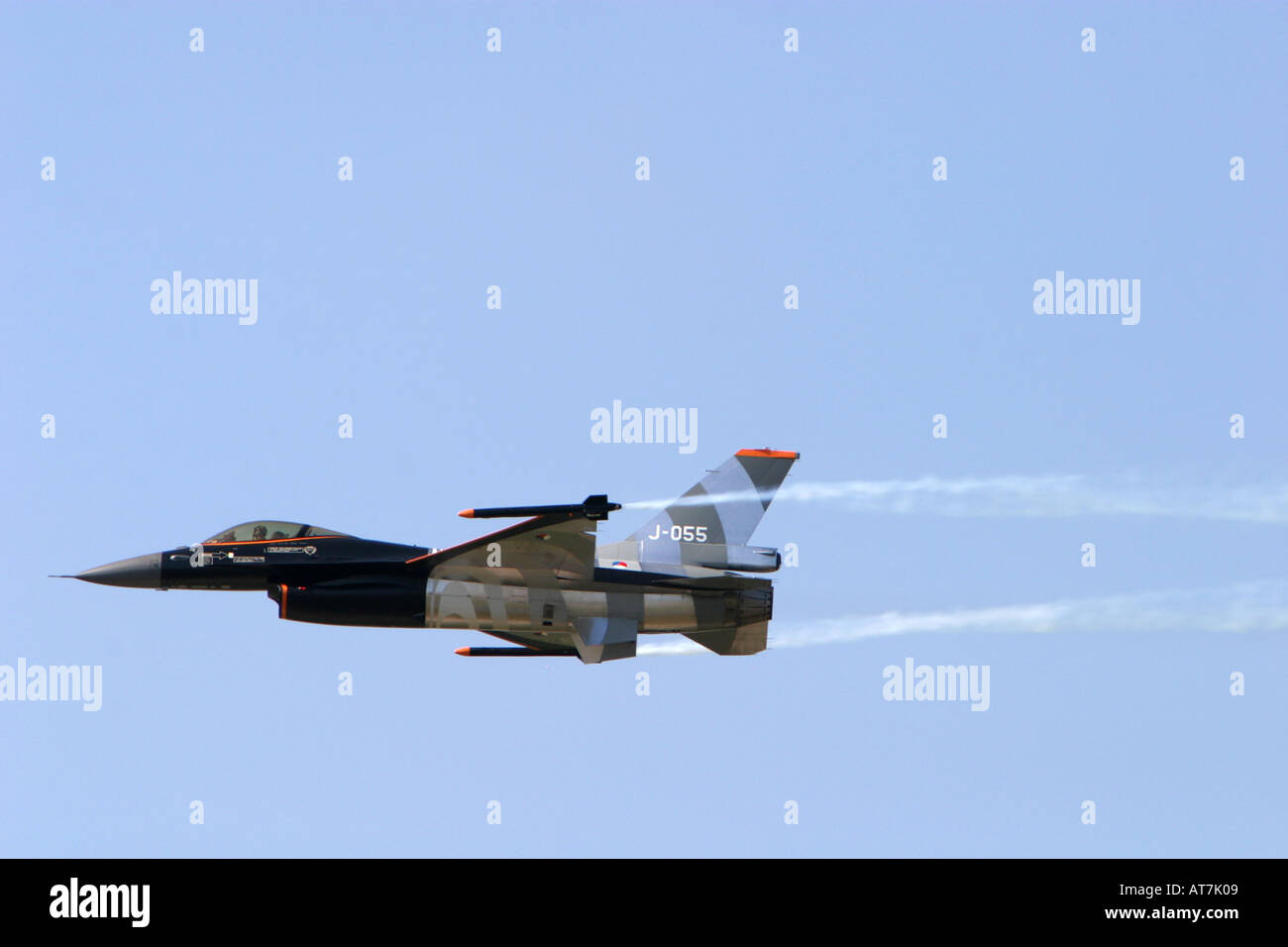 F16 military fighter jet performing an acrobatic display Stock Photo ...