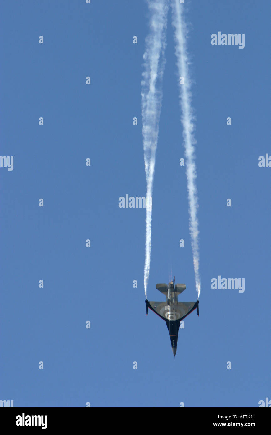 F16 military fighter jet performing an acrobatic display Stock Photo ...