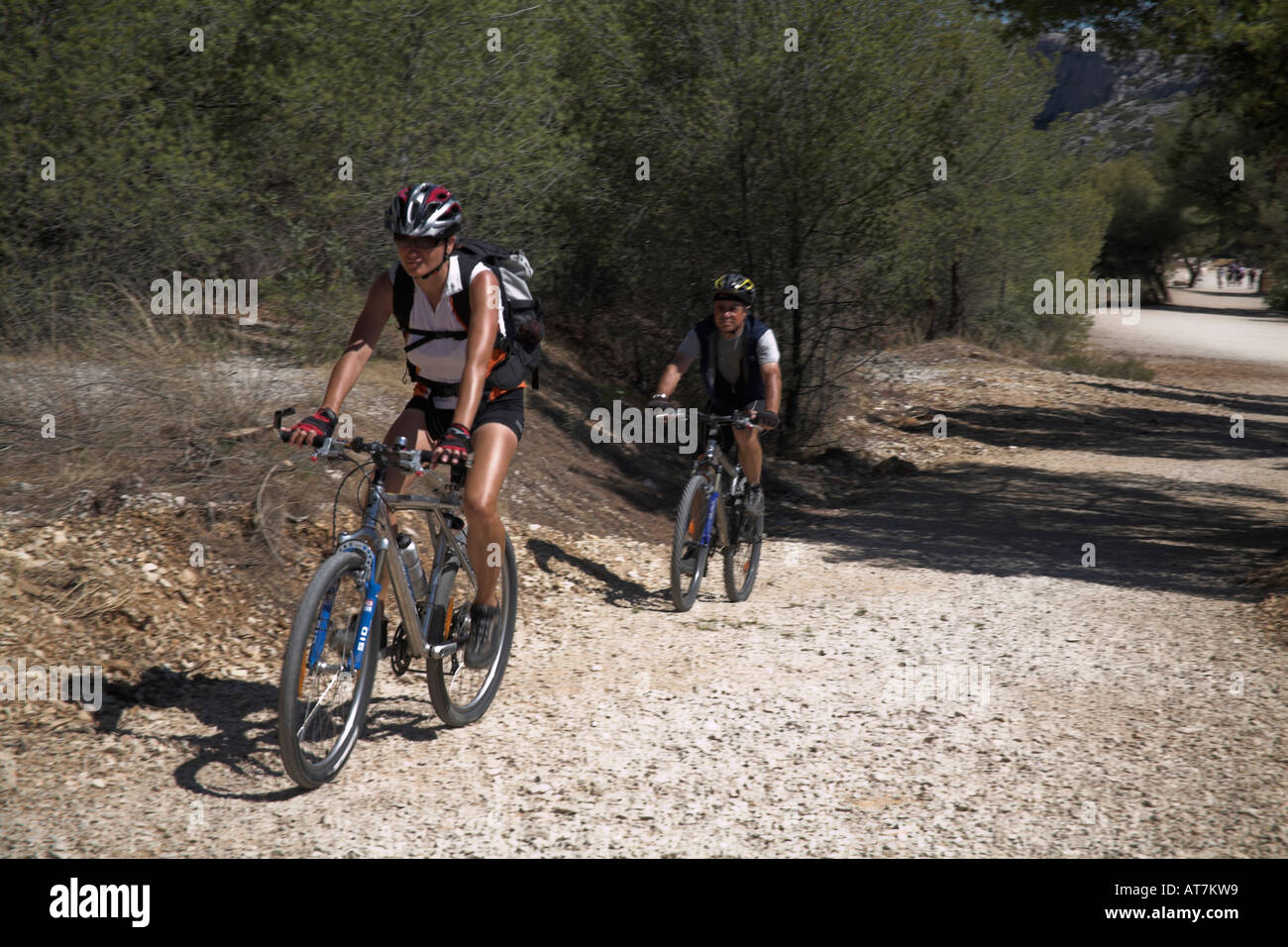 Stock photograph of mountain biking in the Calanques limestone cliffs ...