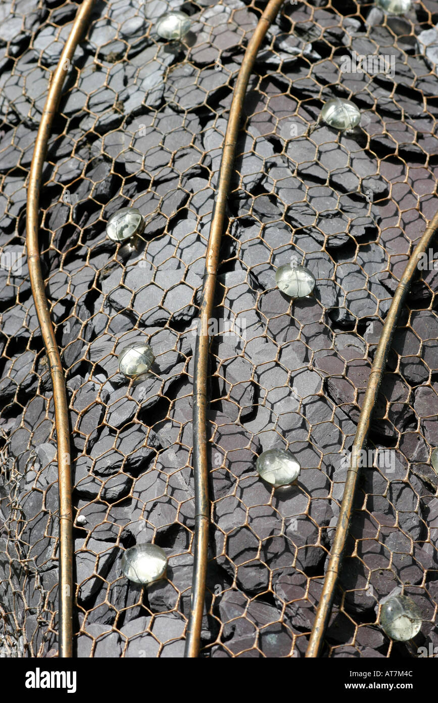 Part of a sculpture made from slate fragments and chicken wire Stock ...