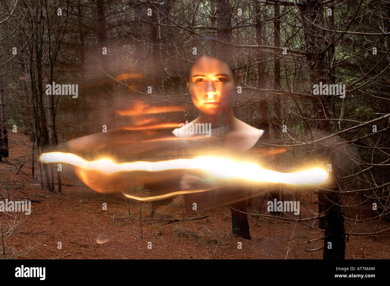 A moving figure in the forest Stock Photo - Alamy