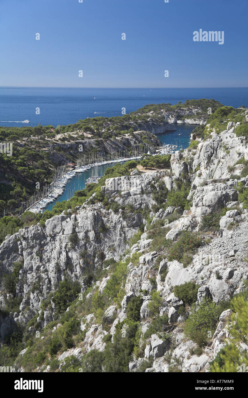 Stock photograph of the Port Miou Calanque limestone cliffs between ...