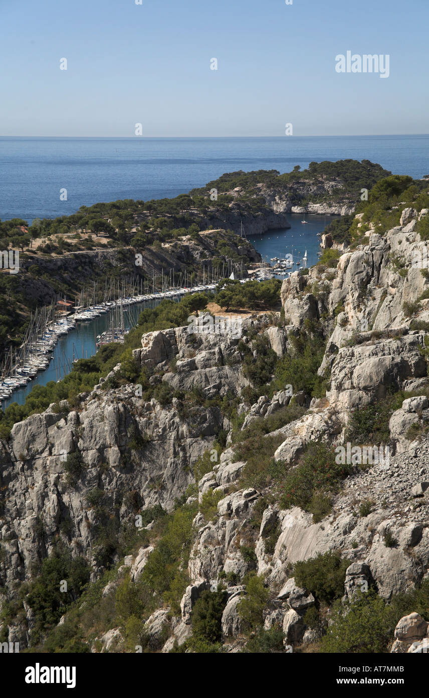 Stock photograph of the Port Miou Calanque limestone cliffs between ...