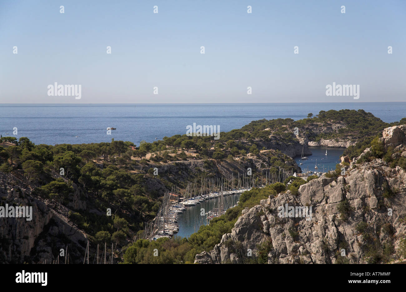 Stock photograph of the Port Miou Calanque limestone cliffs between ...