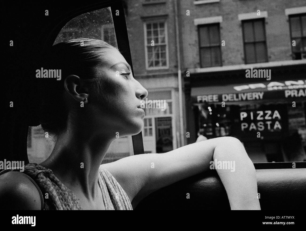 Young woman taking a taxi cab ride in New York City Stock Photo - Alamy