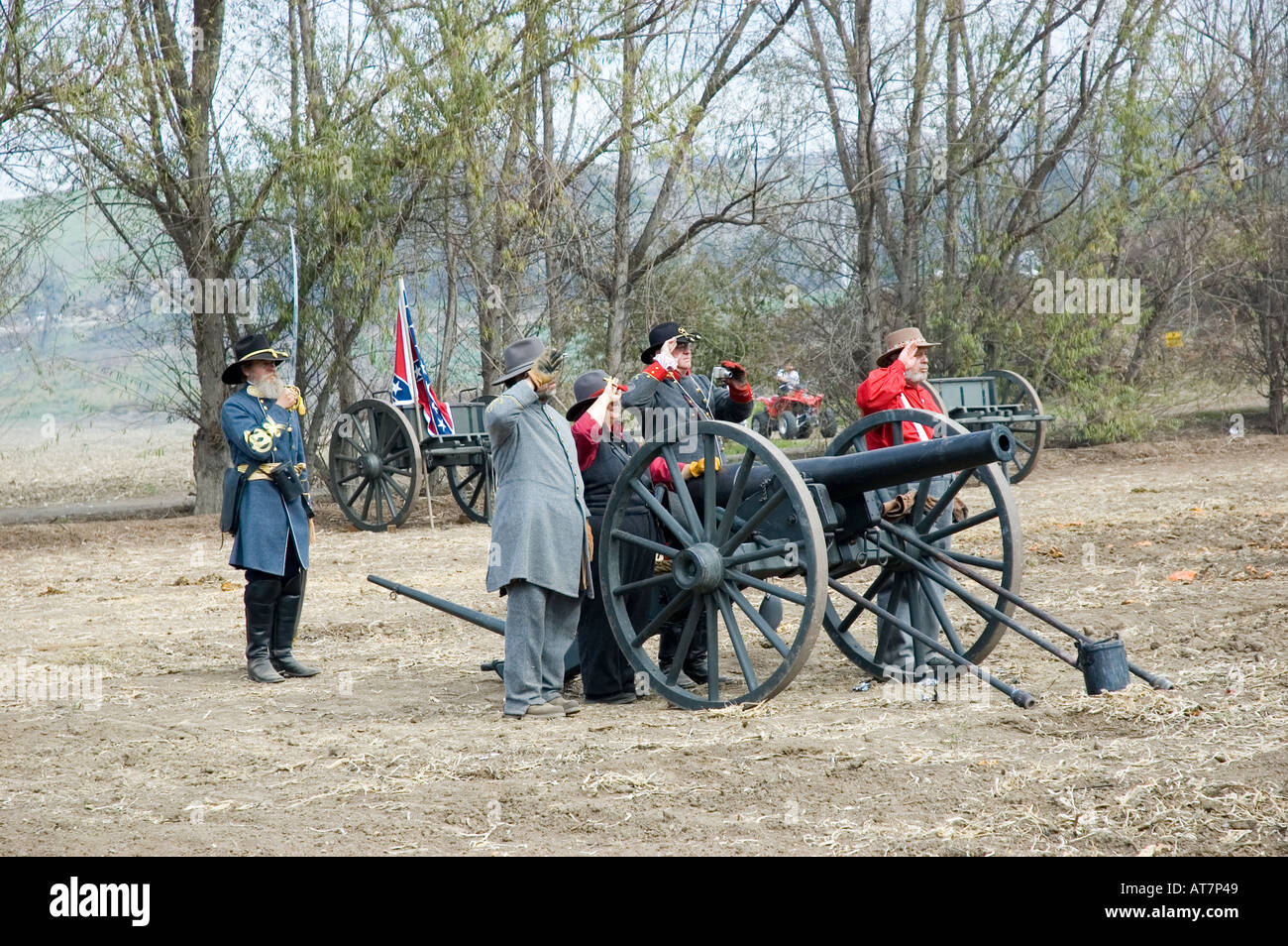 Cannoneers Doing Hand Salute At Civil War Reenactment Event Stock Photo