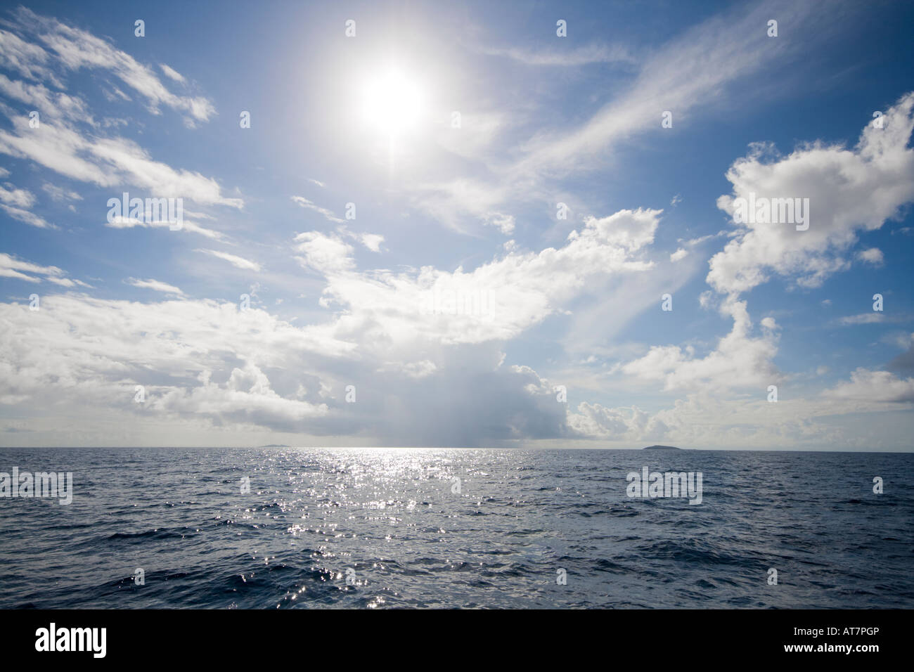 Sun over water Stock Photo - Alamy