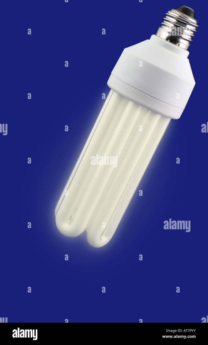 Lamp An electric economic lamp on a dark blue background Stock Photo ...