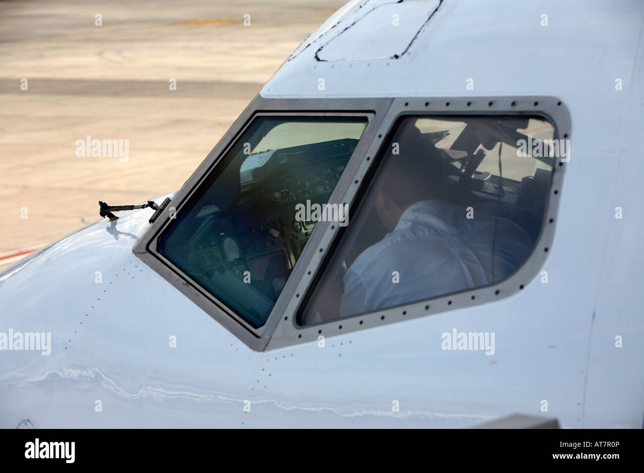 close up of the exterior of cockpit and pilot of Futura Airlines 737 ...