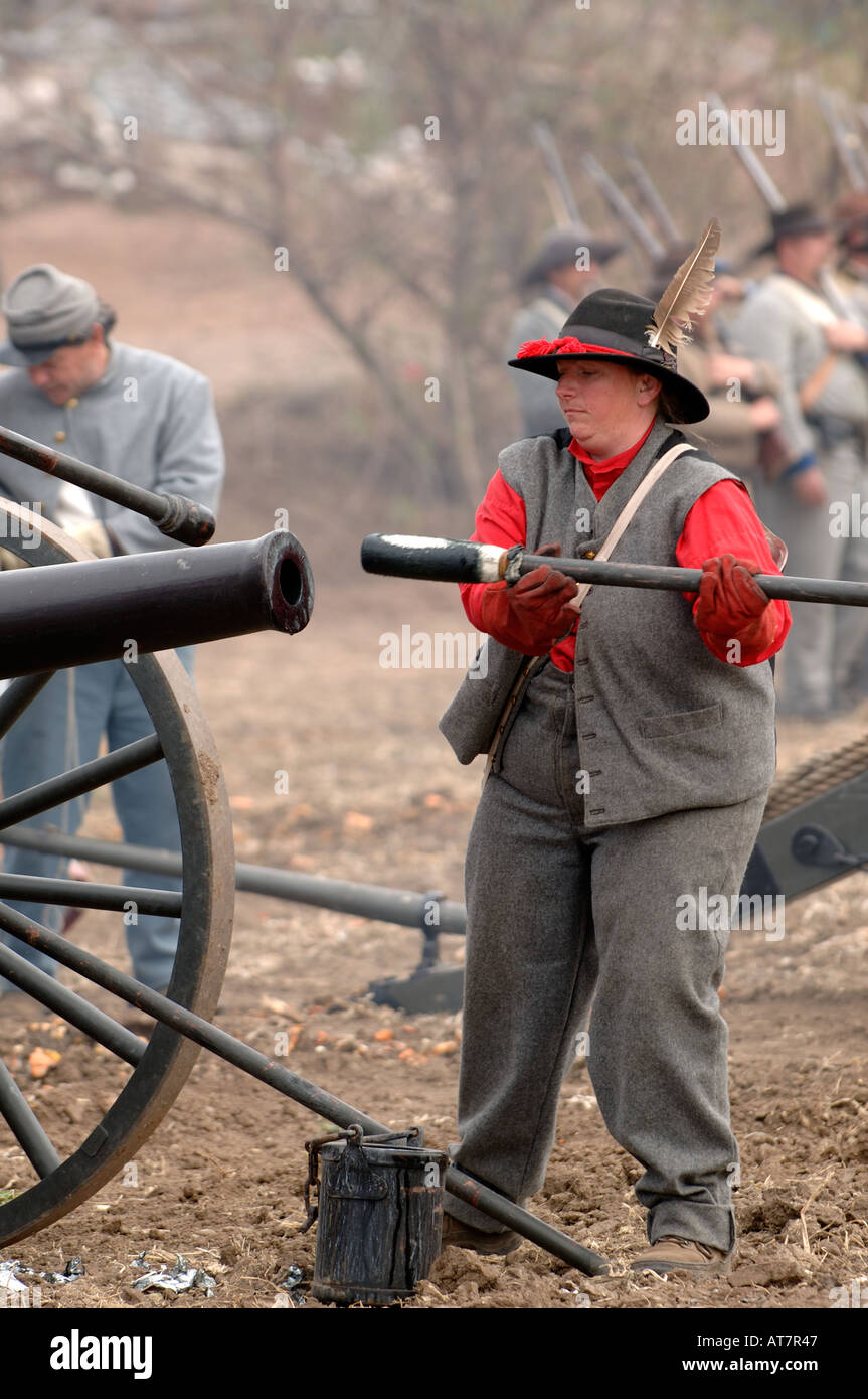 Cannonner loading cannon on battlefield at Civil War Reenactment event ...