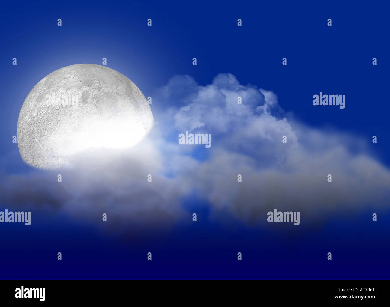 The full moon with light behind clouds Stock Photo - Alamy