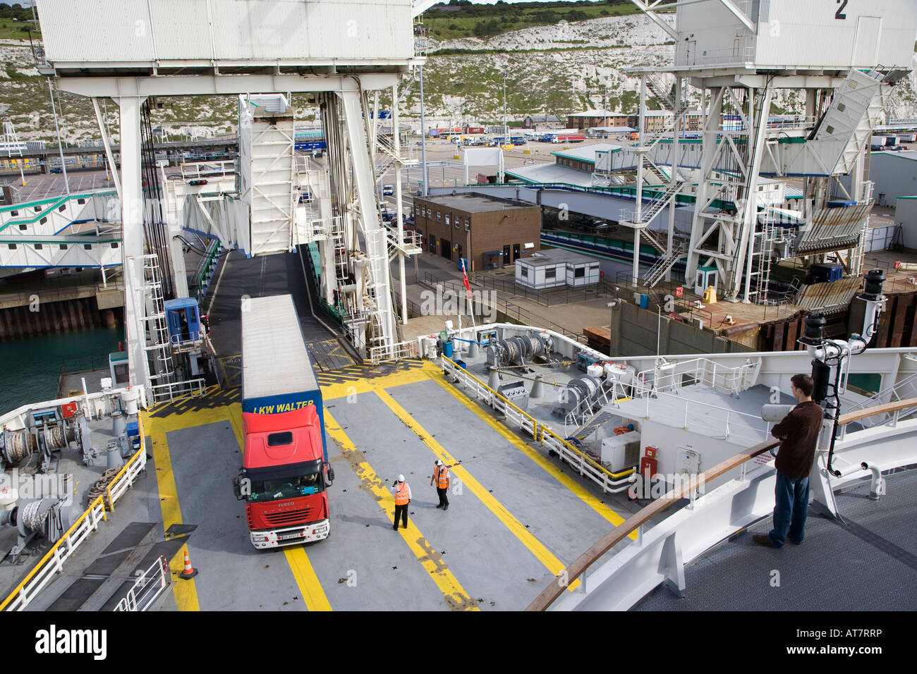 Lorry boarding cross channel ferry watched by passenger Dover UK Stock ...