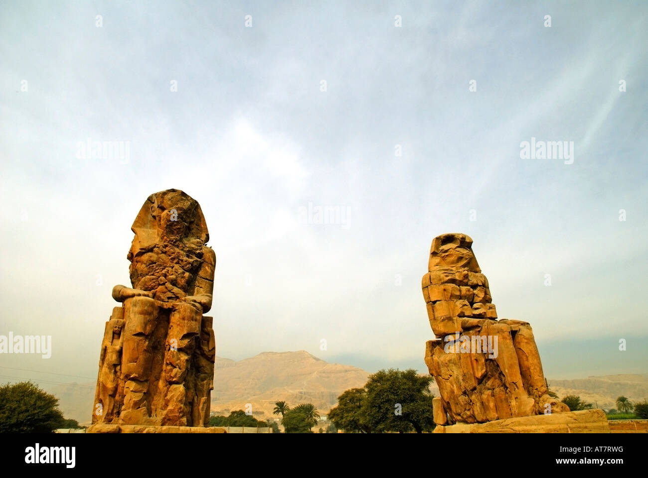 The Colossus of Memnon on the outskirts of Luxor in Egypt are two ...
