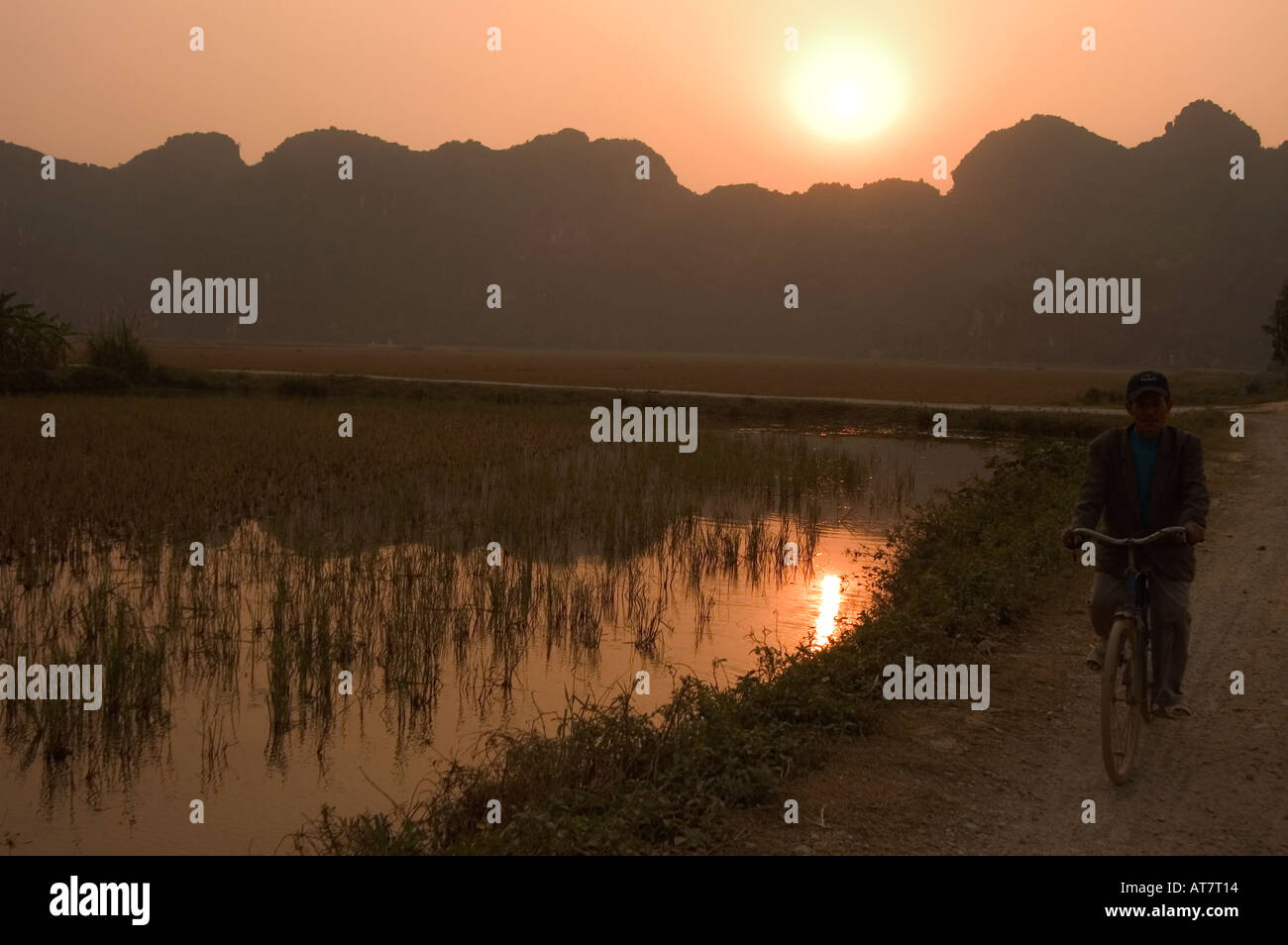 sunset limestone mountain scenery Tam Coc Ninh Binh south of Hanoi ...
