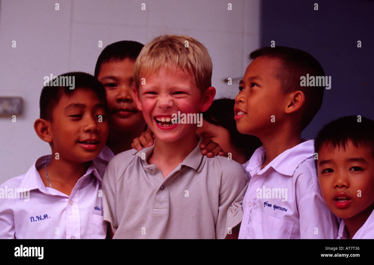 British boy on holiday meets local Thai boys at school, Koh Samet ...