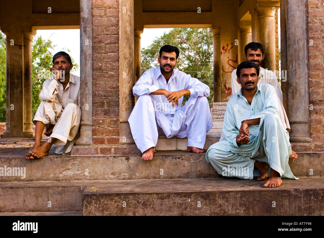 Local Pakistani men sitting in front of Multan main Mausoleum Multan ...