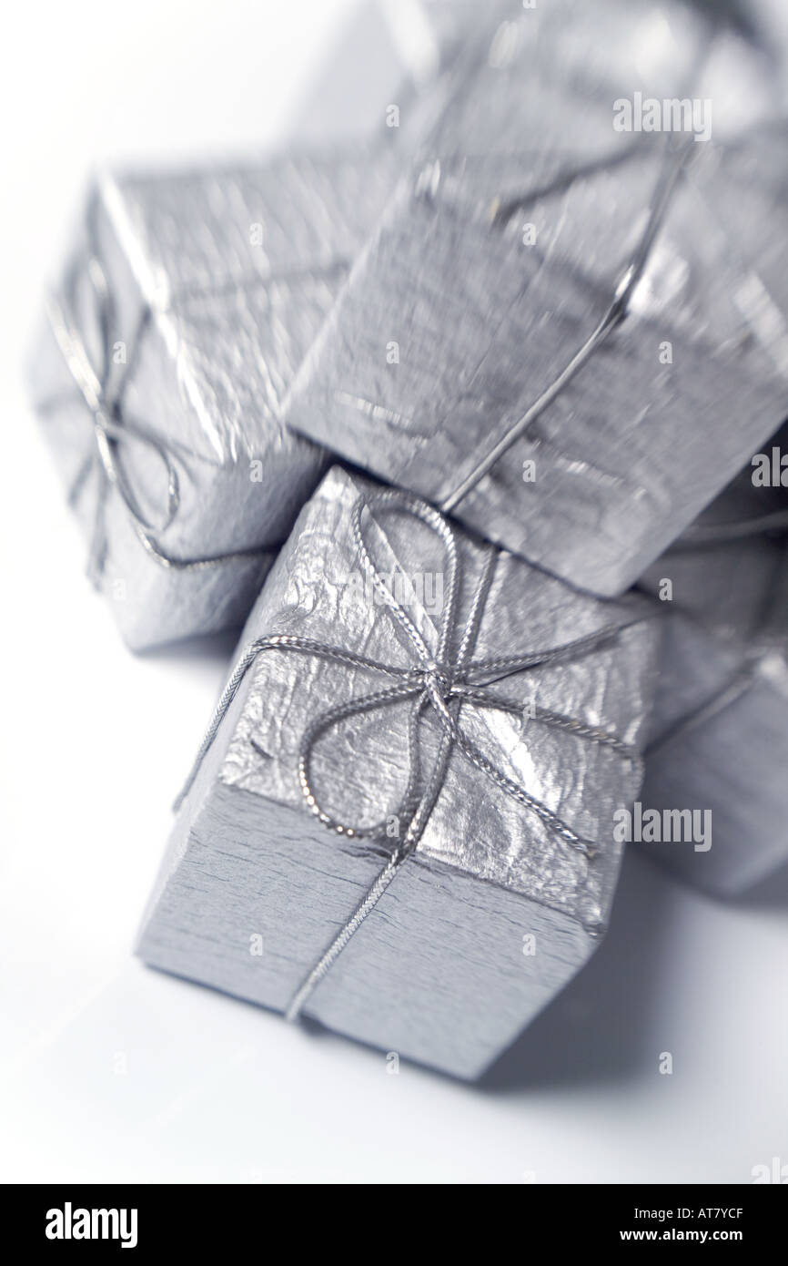 Stacked silver gift boxes hi-res stock photography and images - Alamy